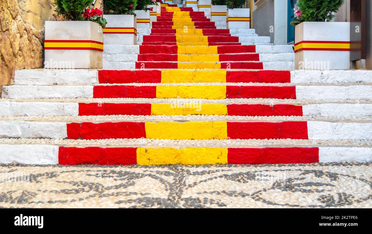 Spanish flag on stairs in Calpe Stock Photo - Alamy