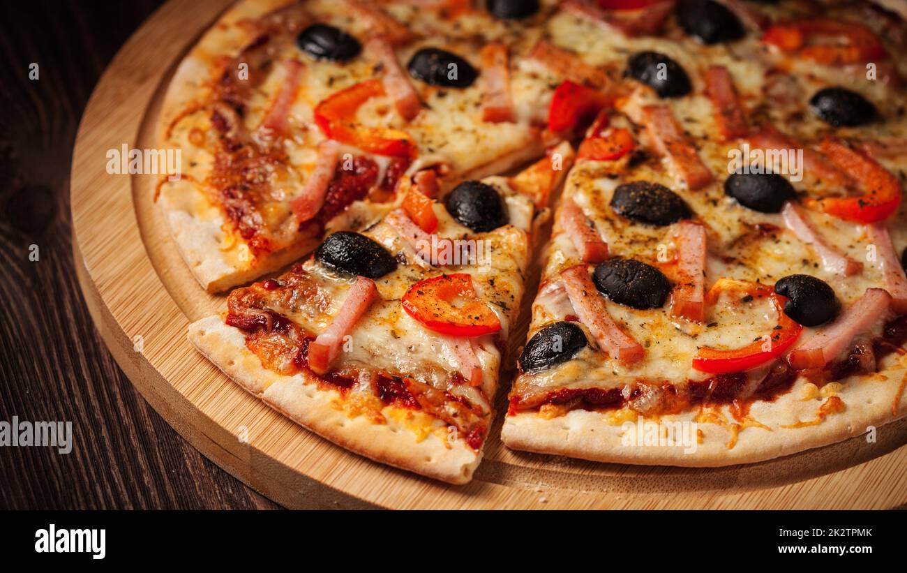 Ham pizza close up letterbox Stock Photo - Alamy