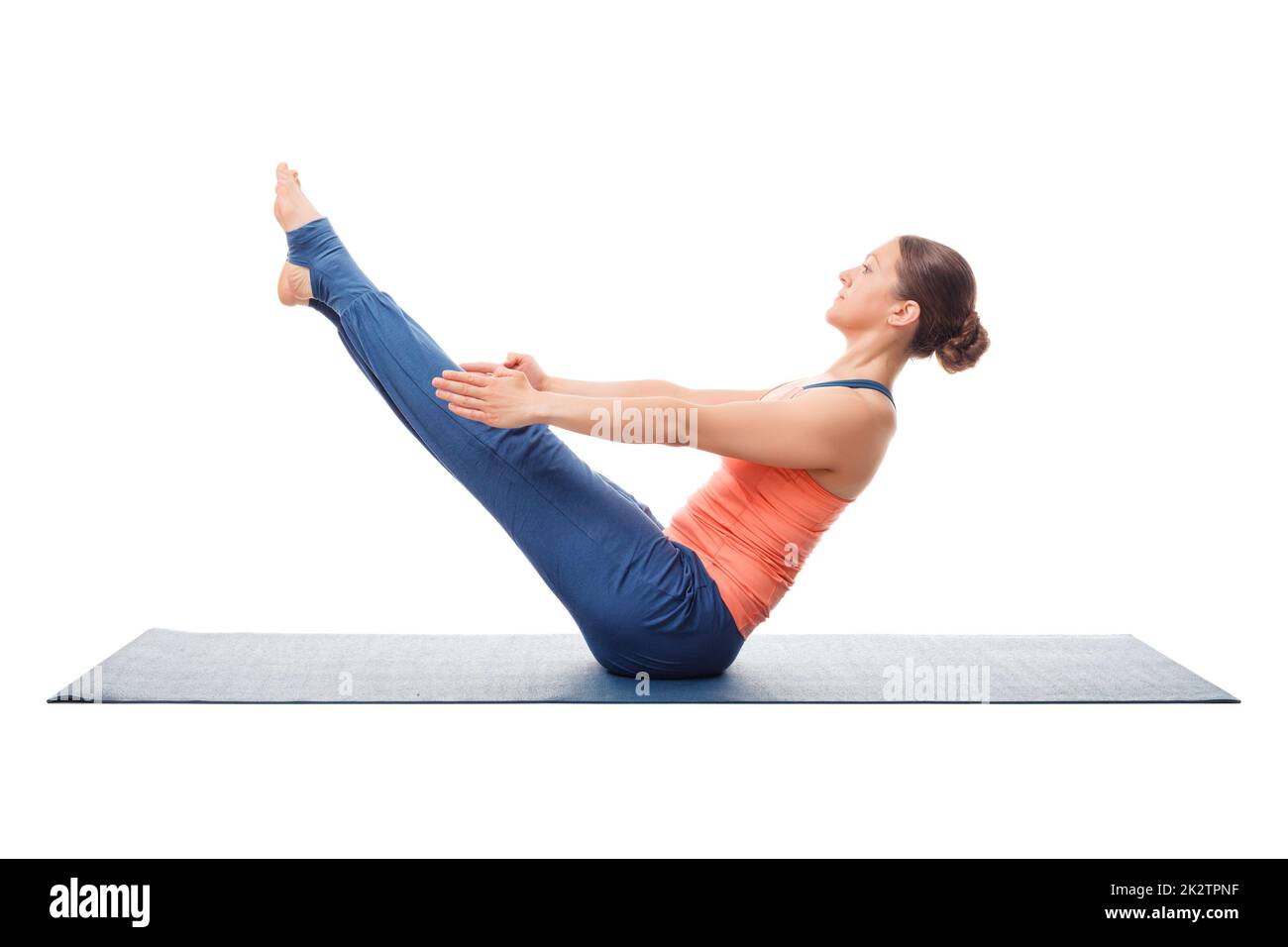 Woman practices yoga asana Paripurna navasana Stock Photo - Alamy