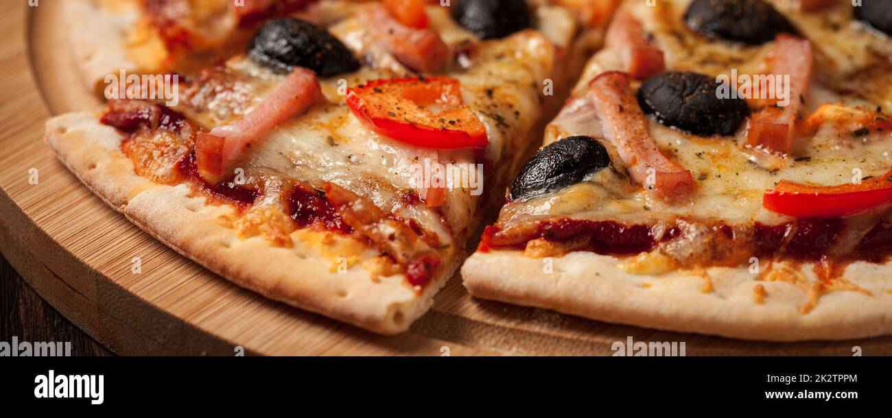 Ham pizza close up letterbox Stock Photo - Alamy