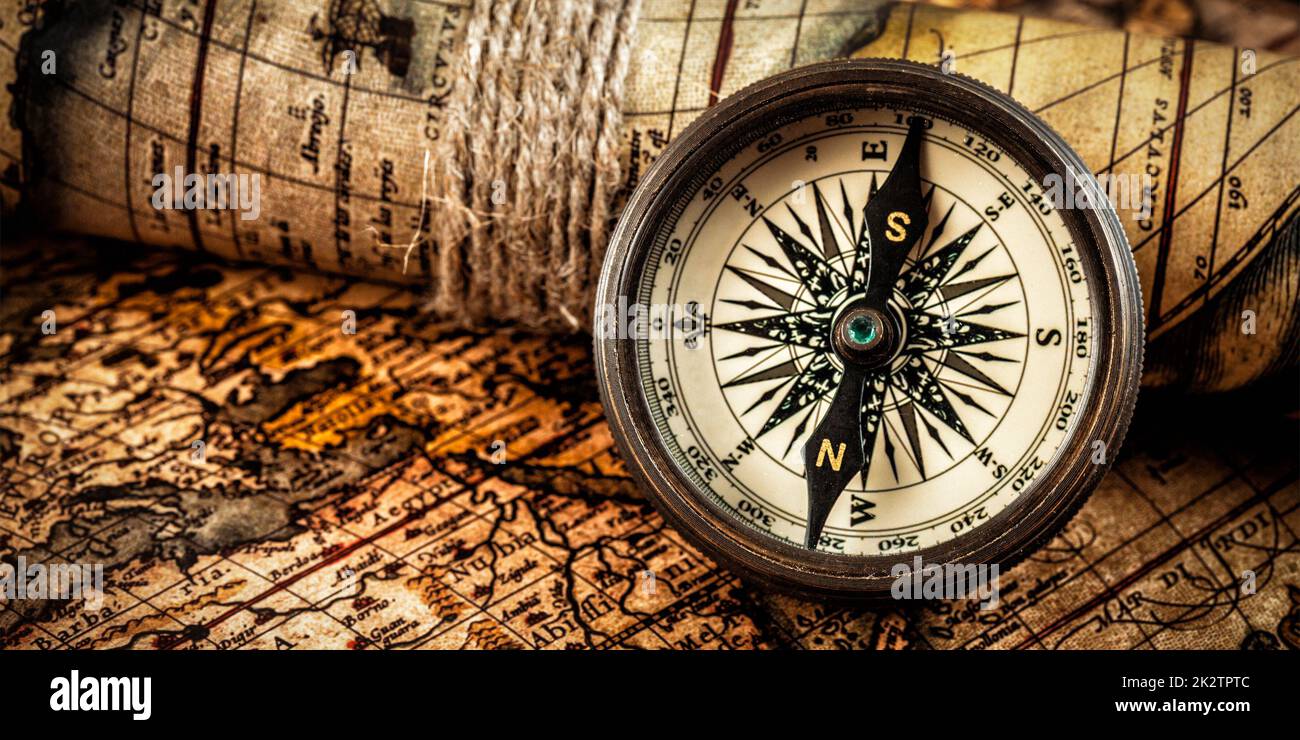 Old vintage compass on ancient map Stock Photo - Alamy