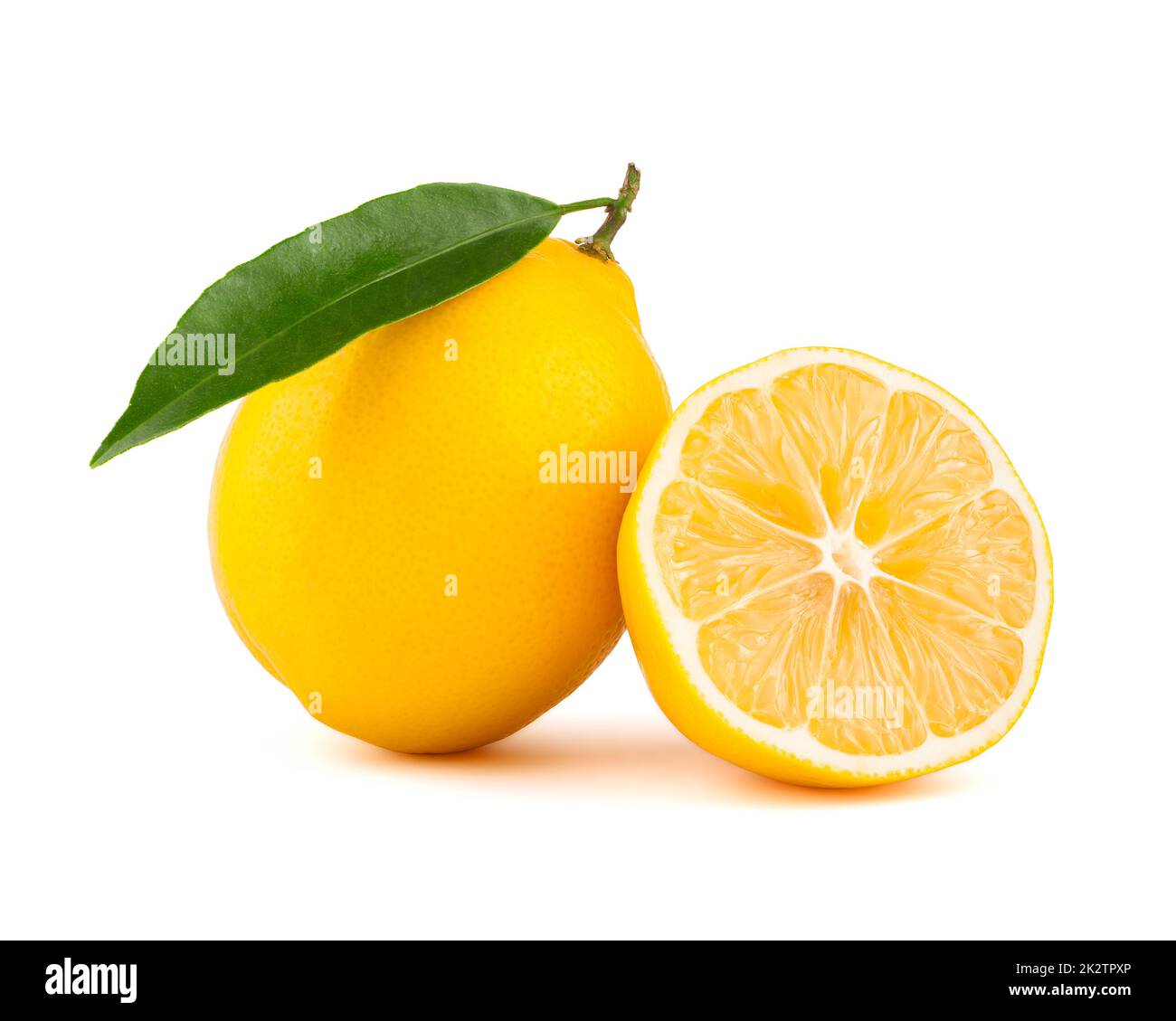 Yellow lemon with slice isolated Stock Photo - Alamy