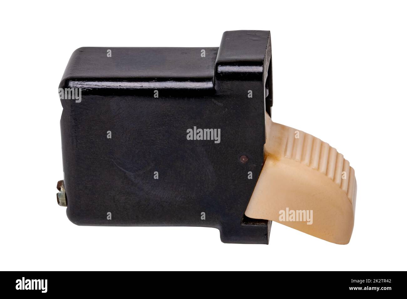 Old car parts. Close-up of an ivory-coloured fluted electric switch ...