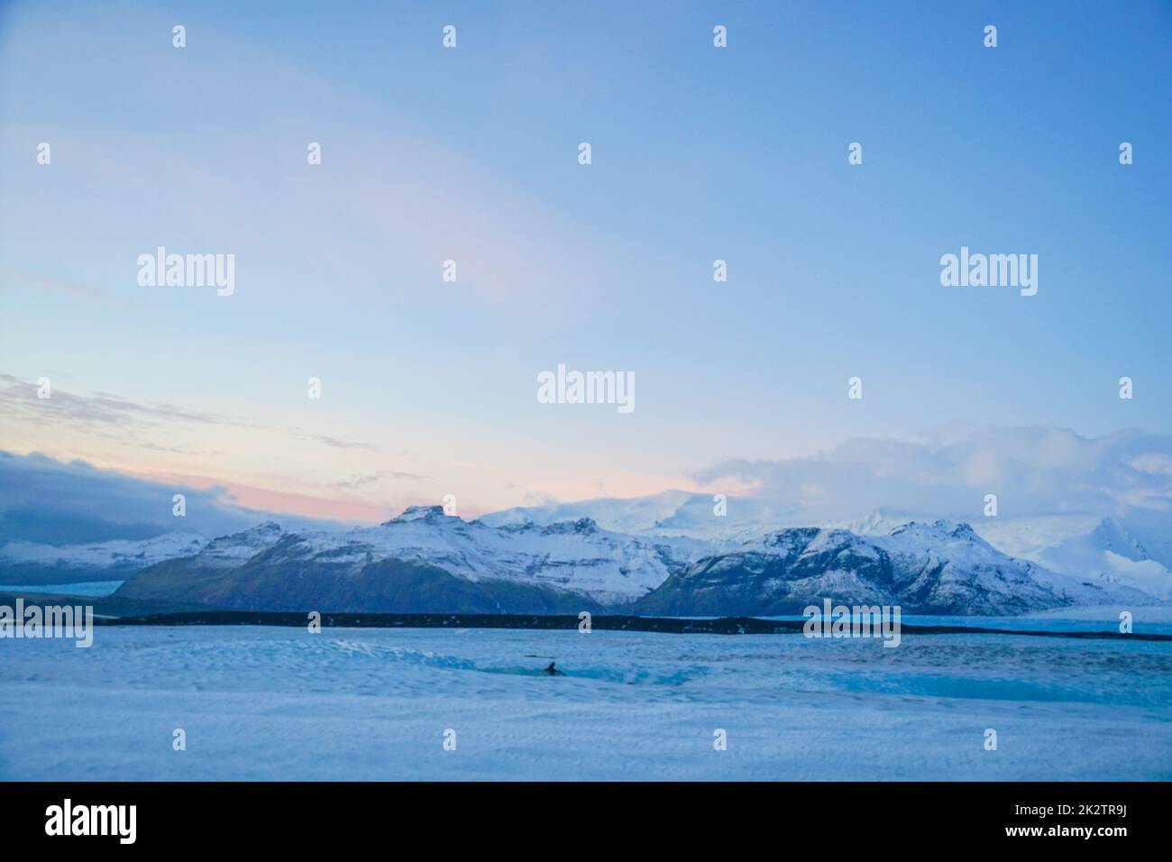 Snow-covered mountains and dusk of Iceland (Vatnajökull). Shooting ...
