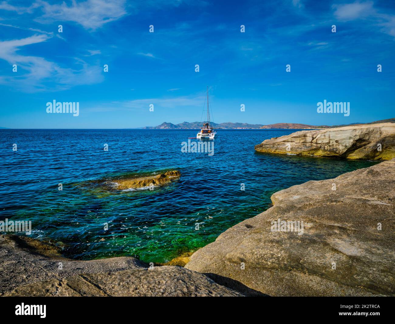 Yacht boat at Sarakiniko Beach in Aegean sea, Milos island , Greece ...