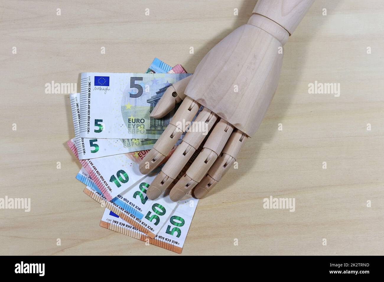 Hand banknotes hi-res stock photography and images - Alamy