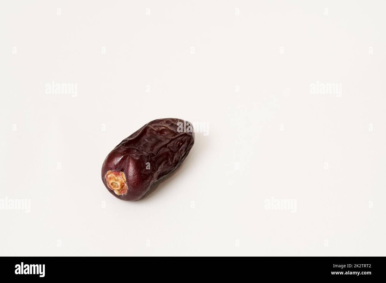 Safawi date on white Stock Photo - Alamy