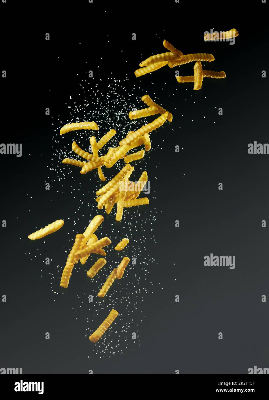 French fries on black background or surface Stock Photo - Alamy
