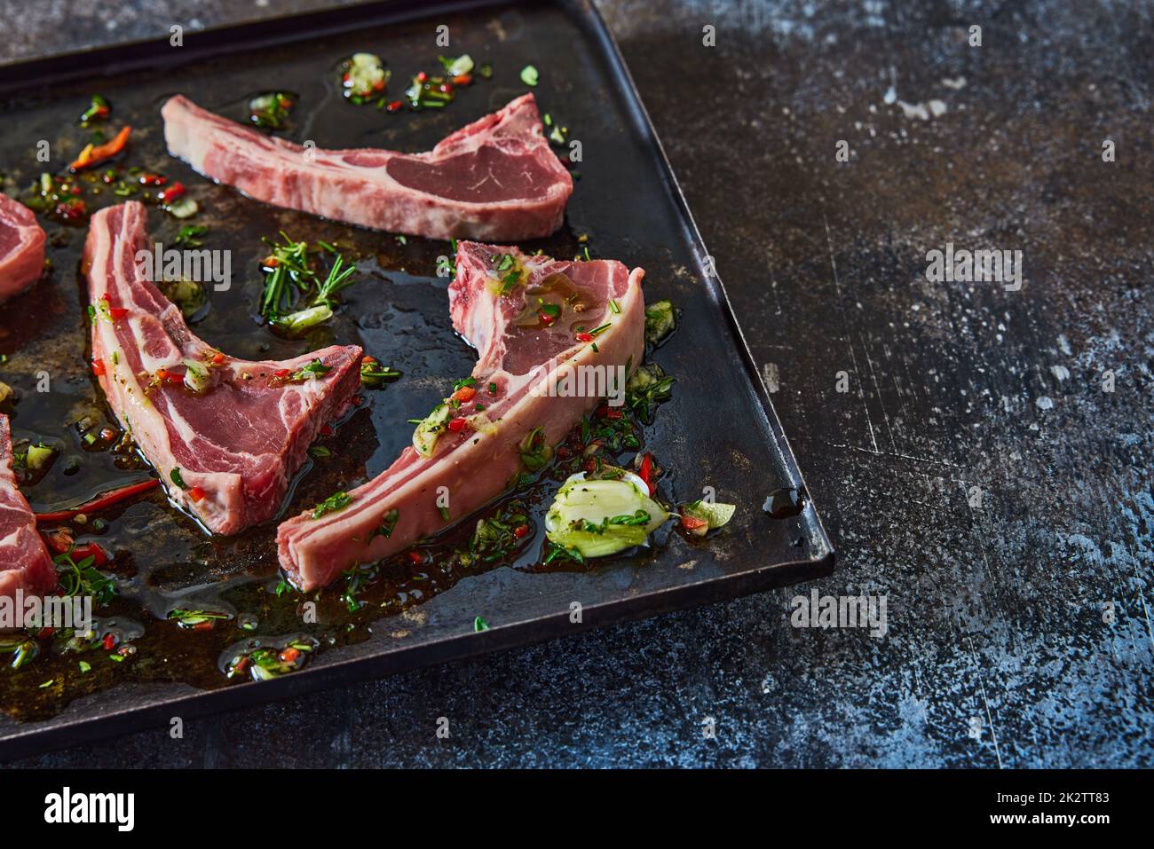 Raw lamb chops on tray Stock Photo - Alamy