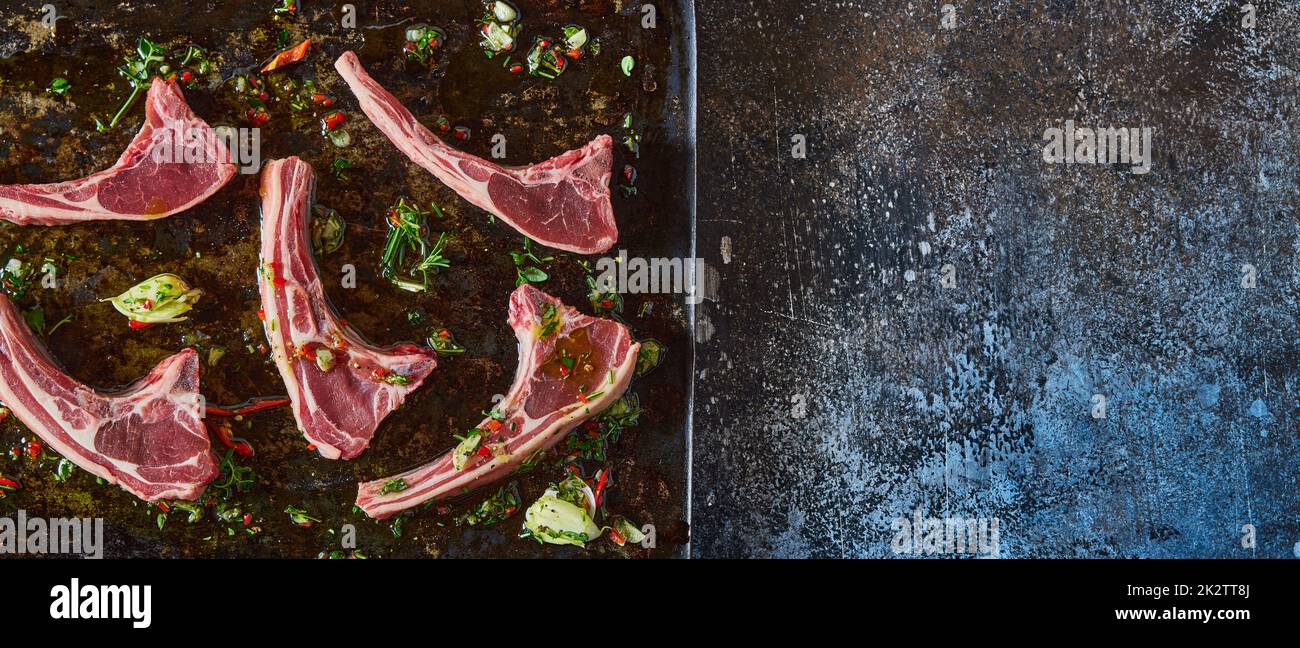 Uncooked lamb chops on tray Stock Photo - Alamy
