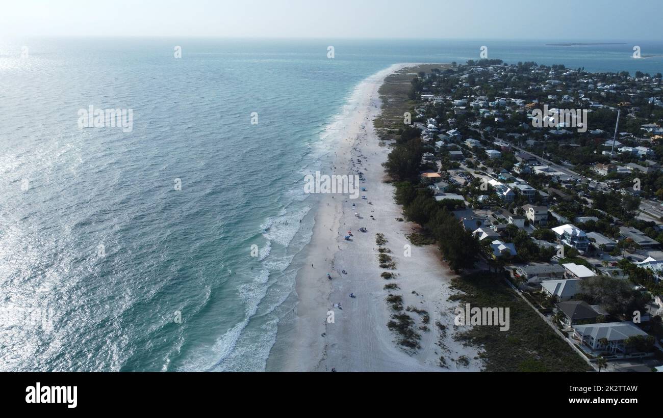 An aerial view of Anna Maria Island on Florida's Gulf Coast in blue sky ...