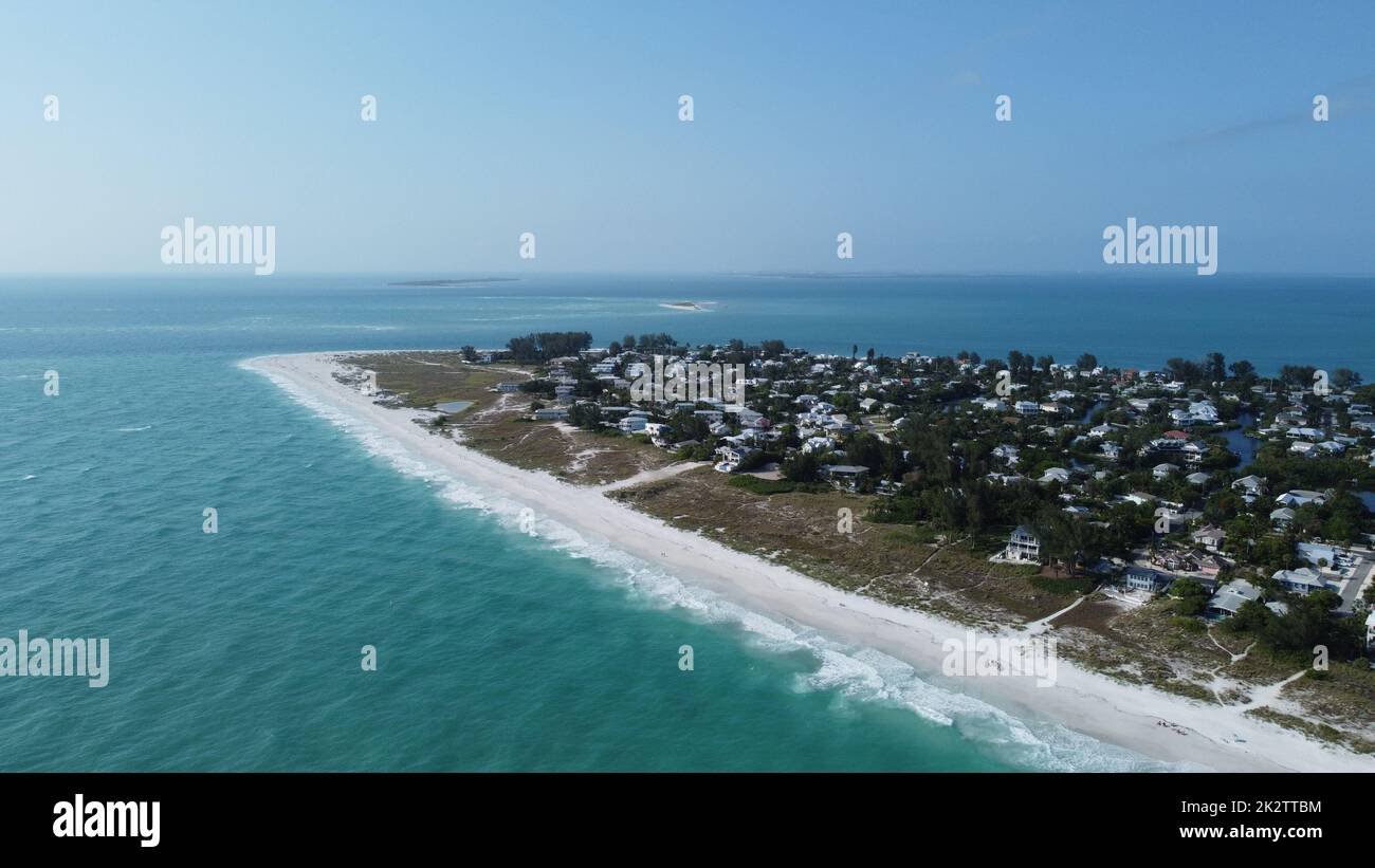 An aerial view of Anna Maria Island on Florida's Gulf Coast in blue sky ...