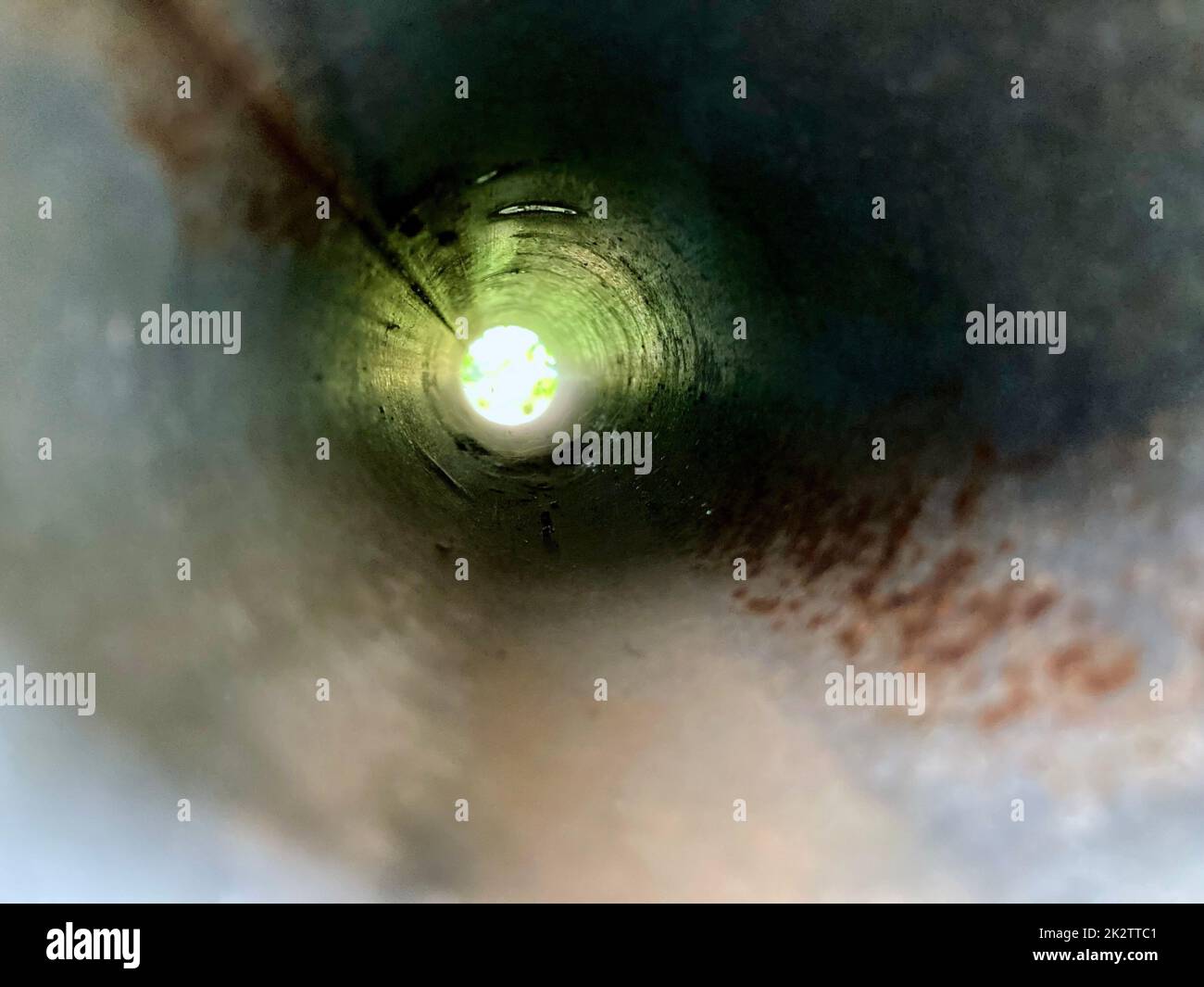 A hole inside a metal tube Stock Photo - Alamy