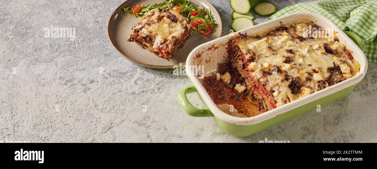 Delicious Greek gratin with meat and eggplants in casserole pan and ...