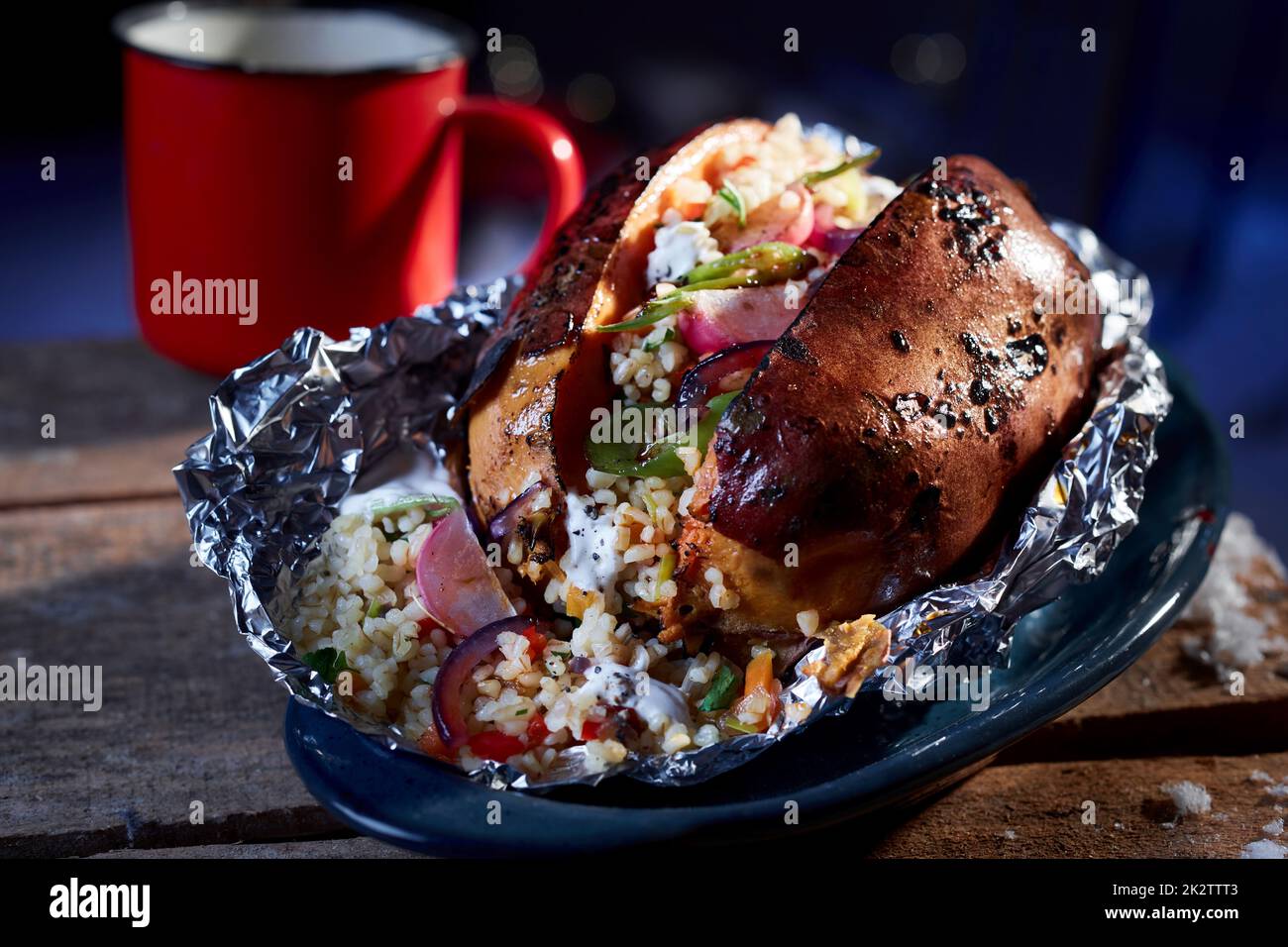 Delicious sweet potato with bulgur with vegetables Stock Photo - Alamy