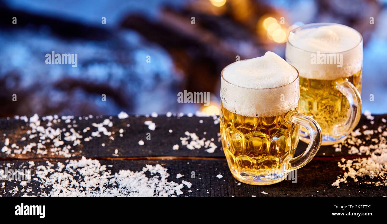Jars of beer on wooden table Stock Photo - Alamy