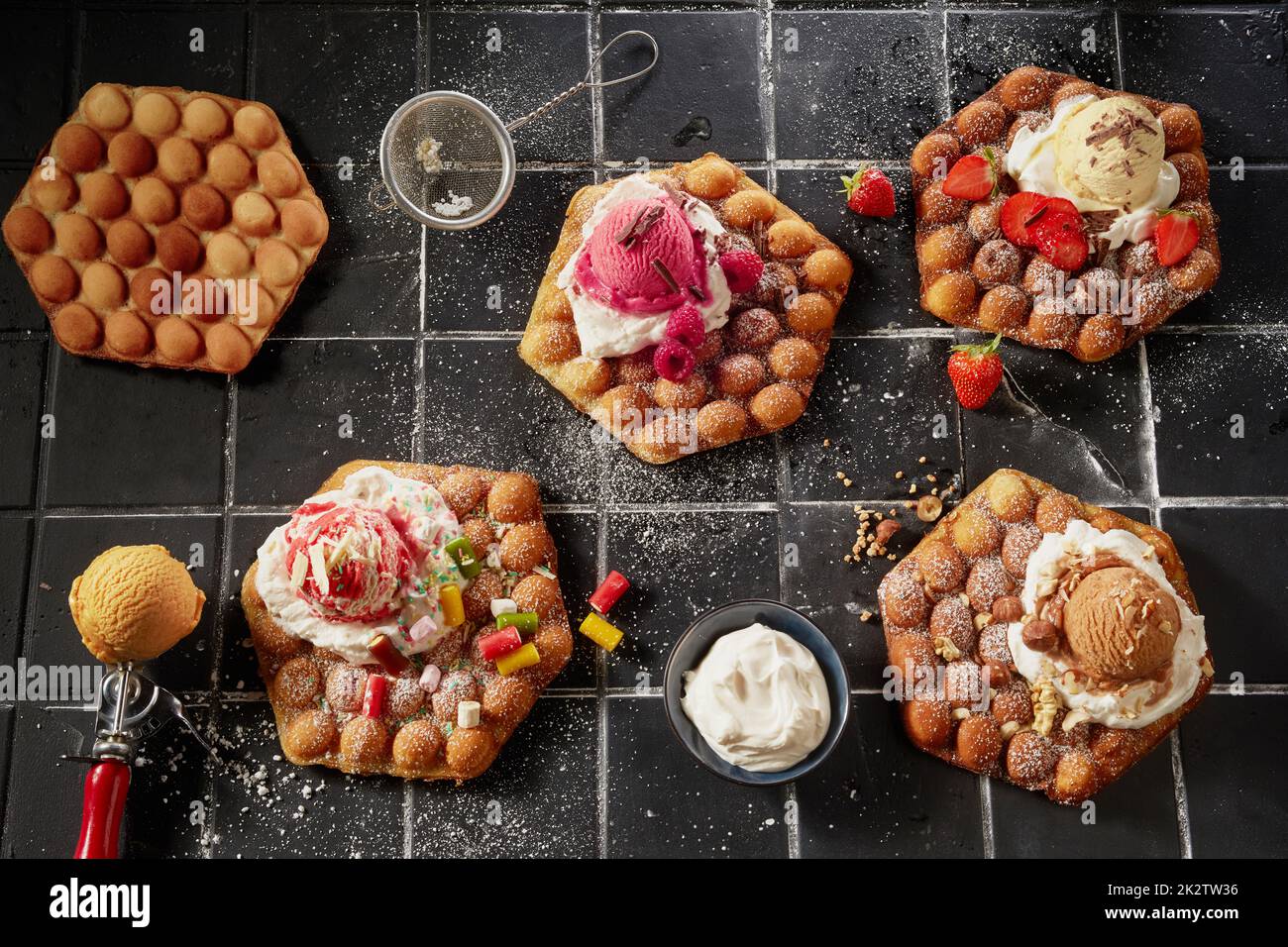 Top down on an assortment of bubble waffles with ice-cream Stock Photo ...