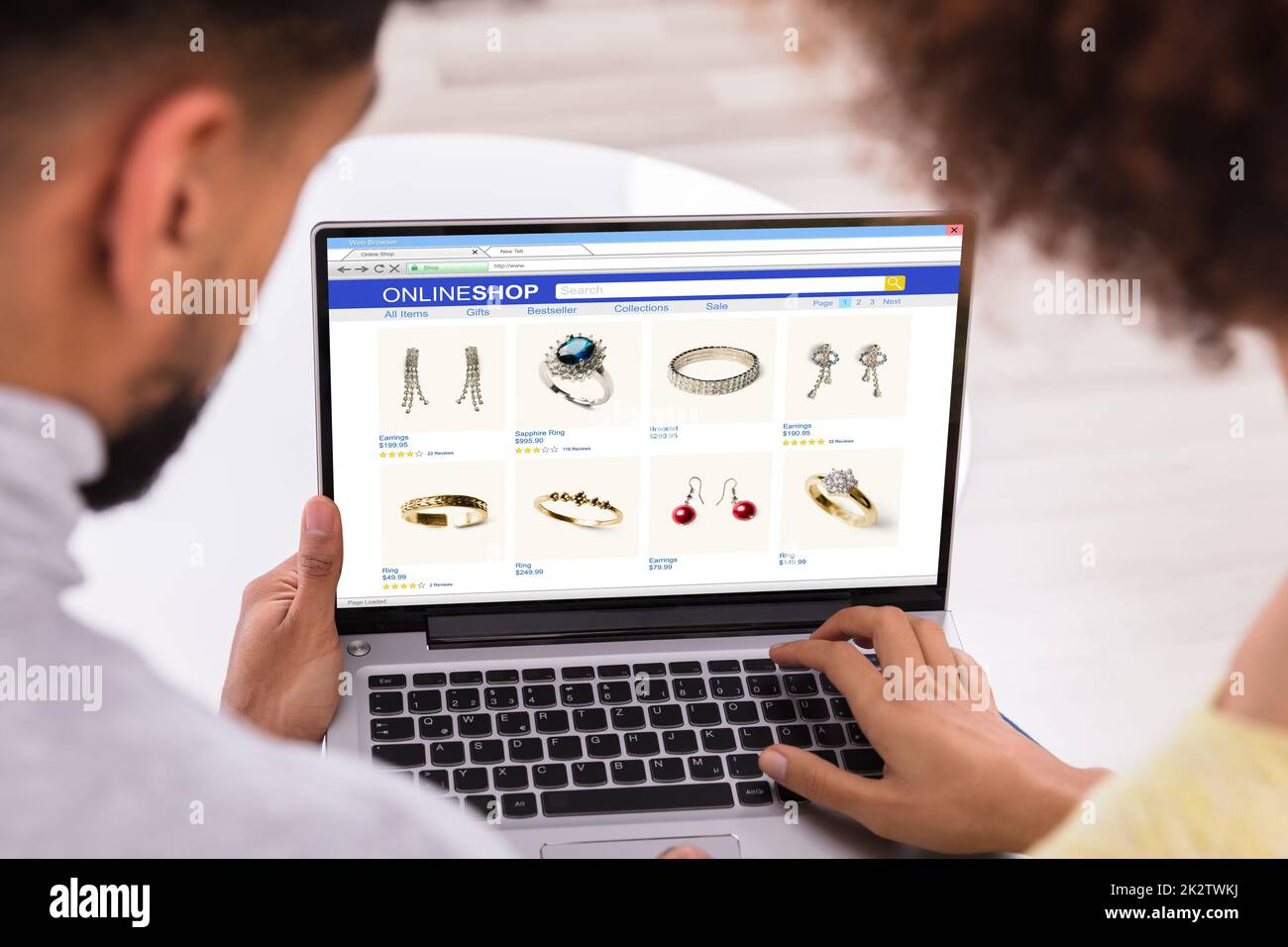 Couple using laptop online shopping hi-res stock photography and images ...