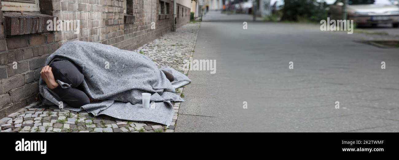 Homeless Man Sleep On Street Stock Photo - Alamy
