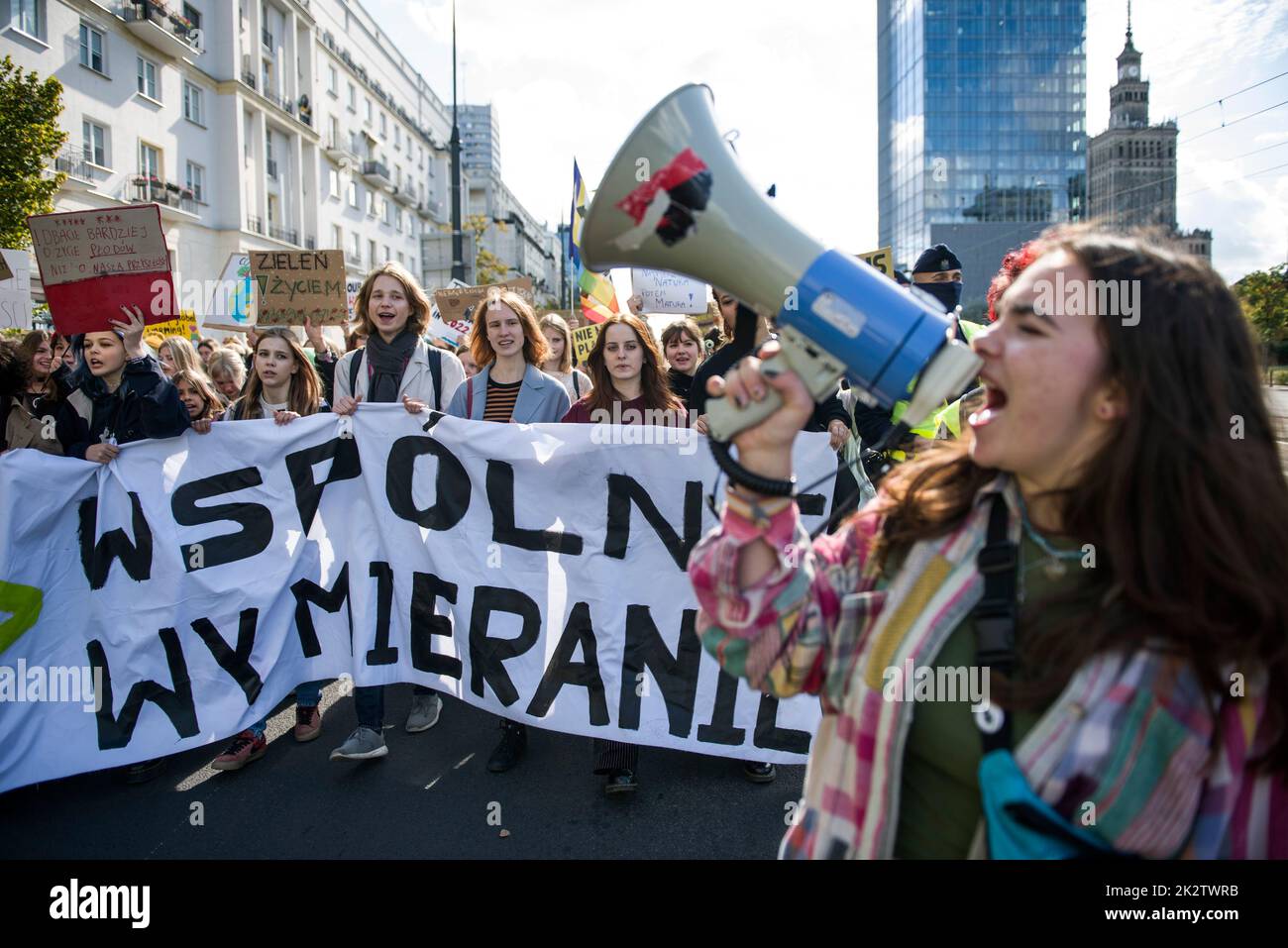 A protester chants slogans through a megaphone during the demonstration ...