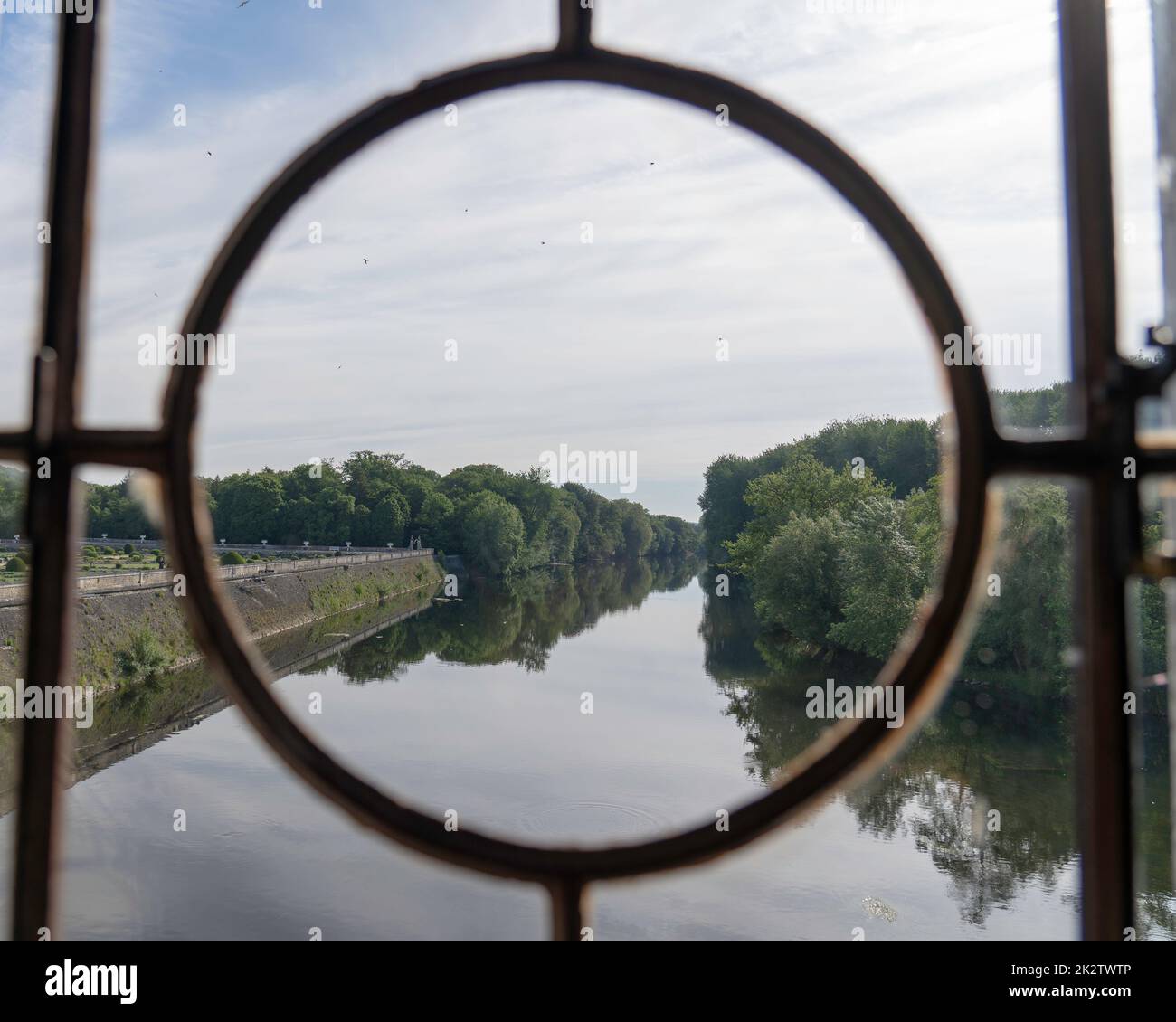 The reflections of river through a castle circle shaped window Stock ...
