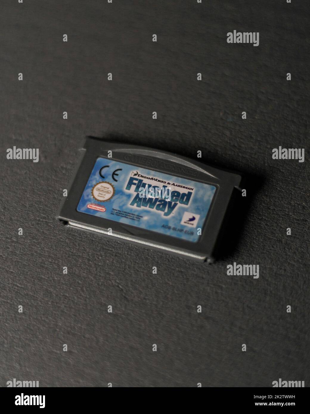 A vertical shot of a vintage Flushed Away Game Boy Advance SP Game ...