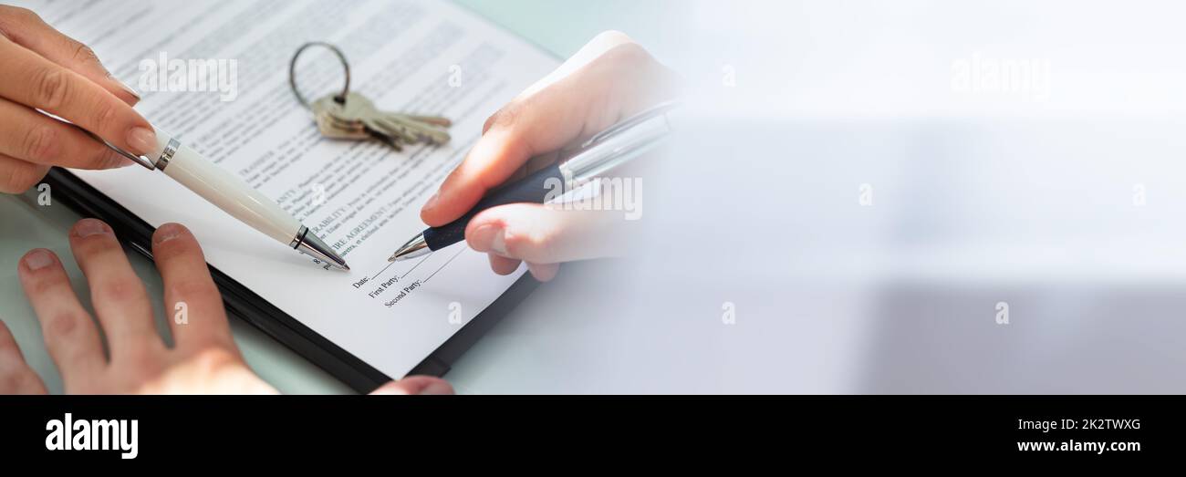 Close-up Of A Person's Hand Filling Contract Form Stock Photo - Alamy
