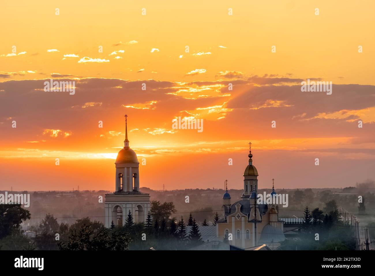 Golden domes with Orthodox crosses on the church.Temple or cathedral on ...