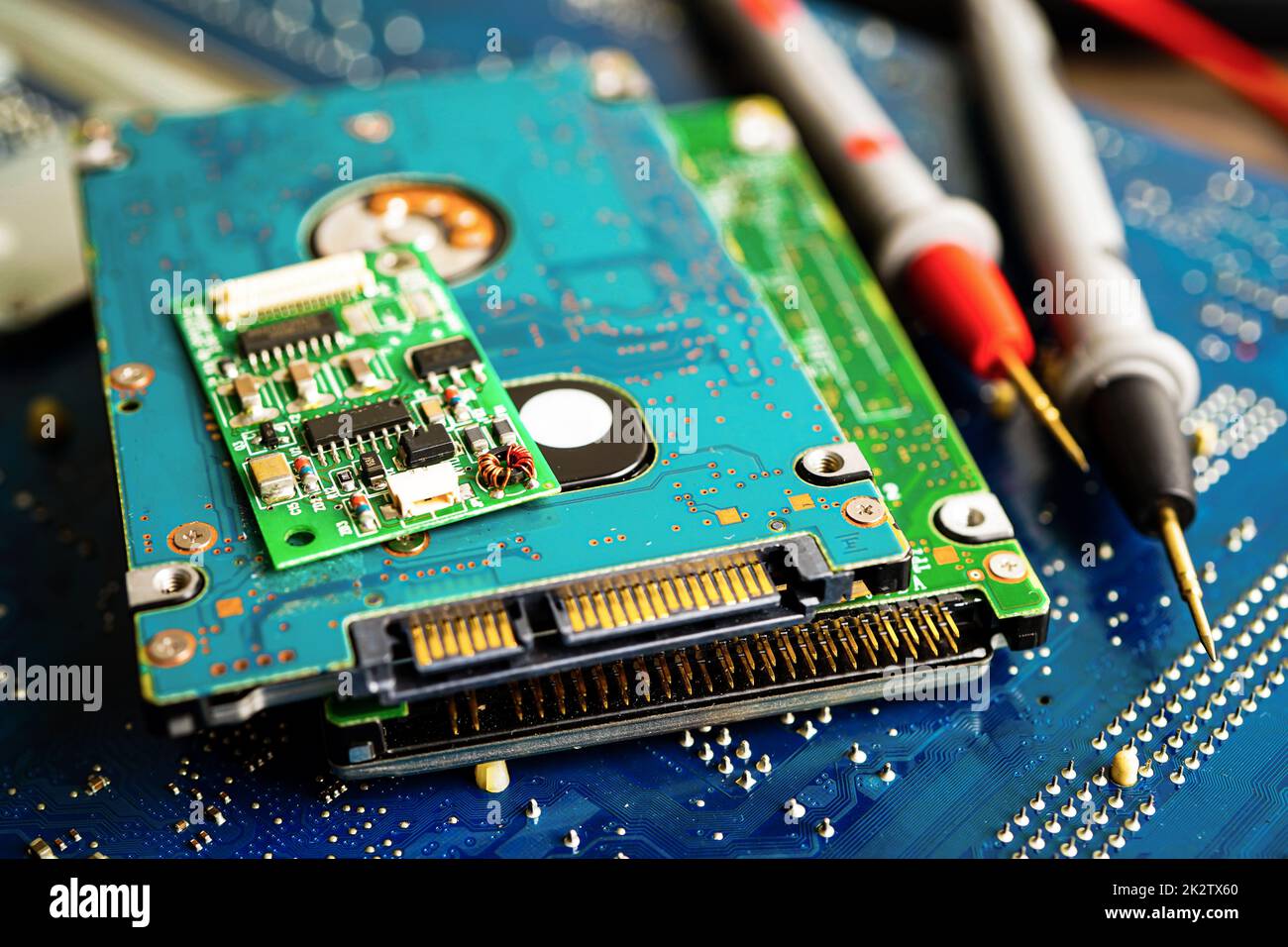 Asian Technician repairing micro circuit main board computer electronic technology, hardware ...