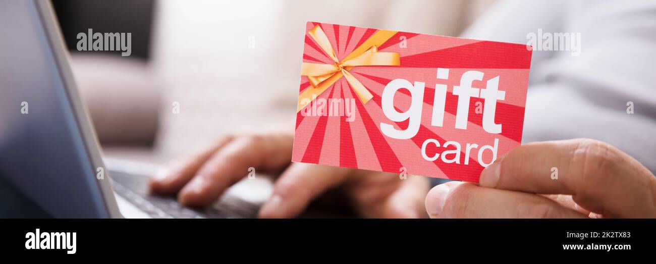 Human Hand Holding Gift Card Stock Photo - Alamy