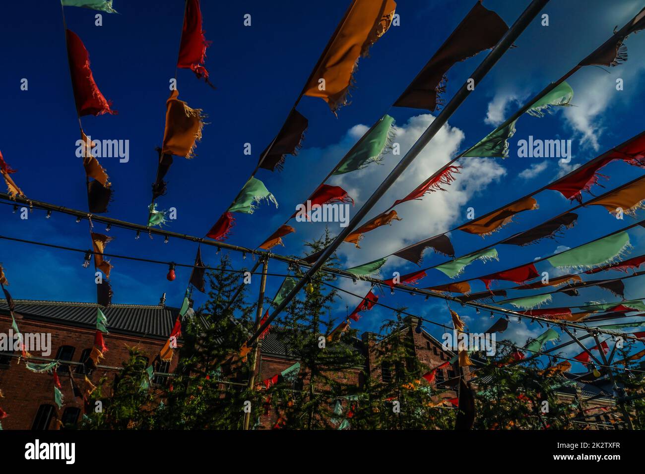 Colorful cloth and summer sky fluttering Stock Photo - Alamy