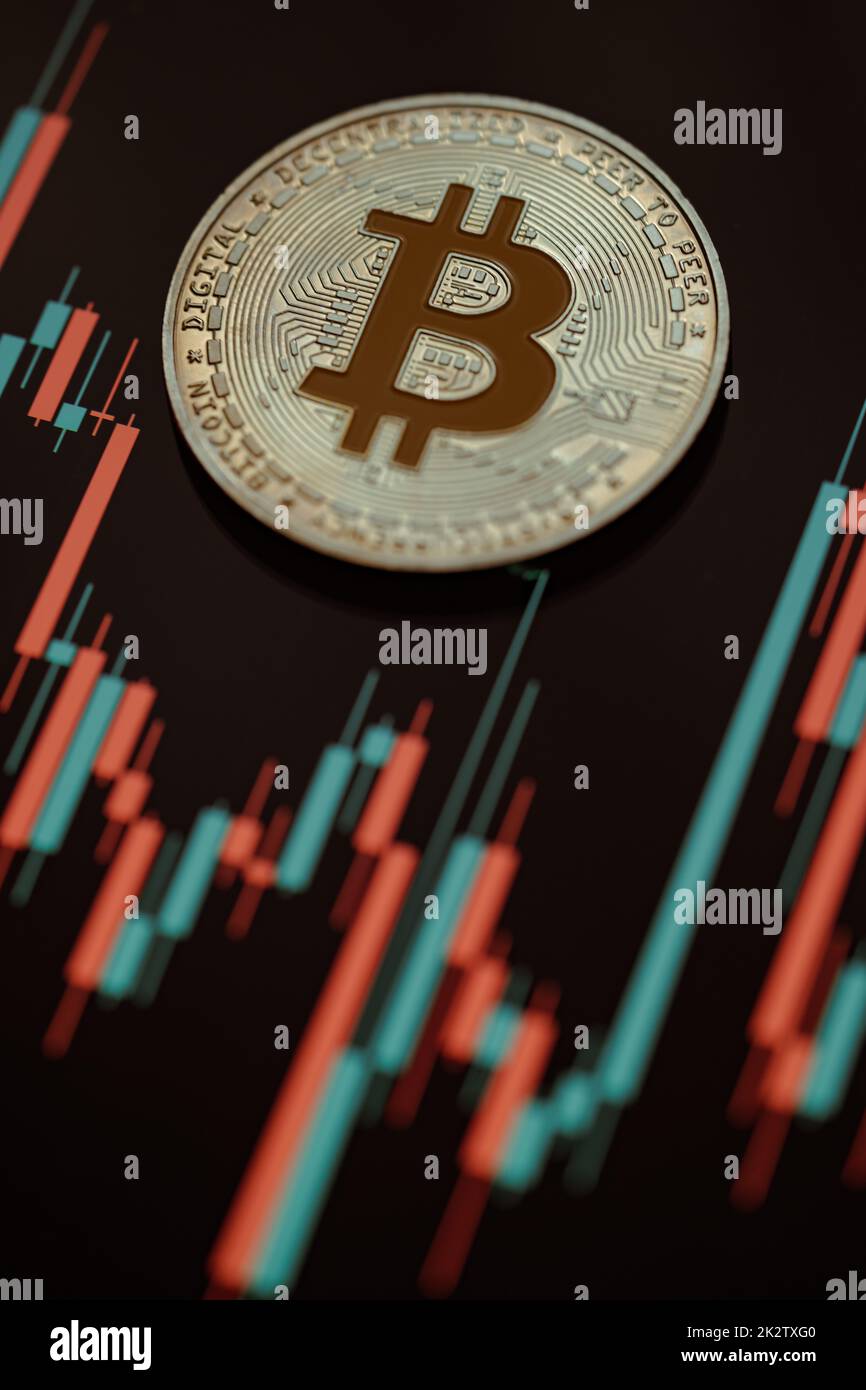Gold Bitcoin with candle stick graph chart and digital background Stock ...