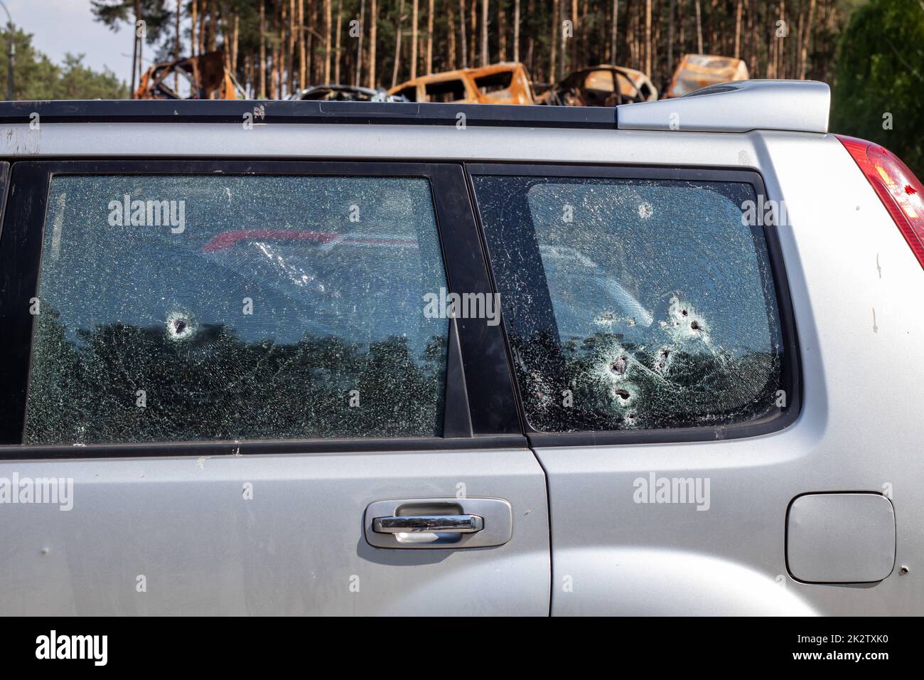 Traces of shots on the body of the car. War between Russia and Ukraine ...