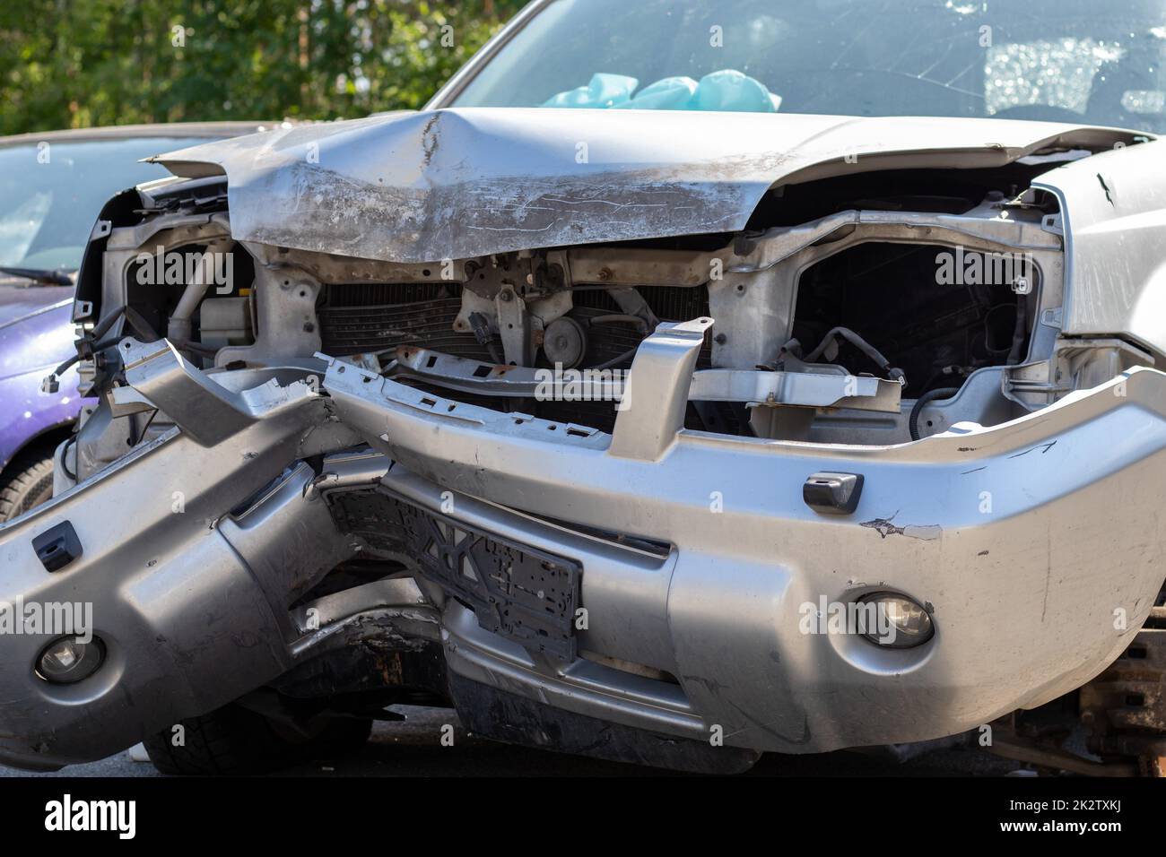 Traffic accident on the street, damaged car after a collision in the ...