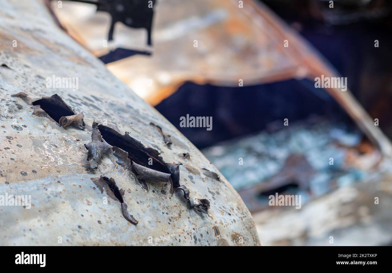 The car was completely destroyed by fire. Abandoned, burnt and rusty ...