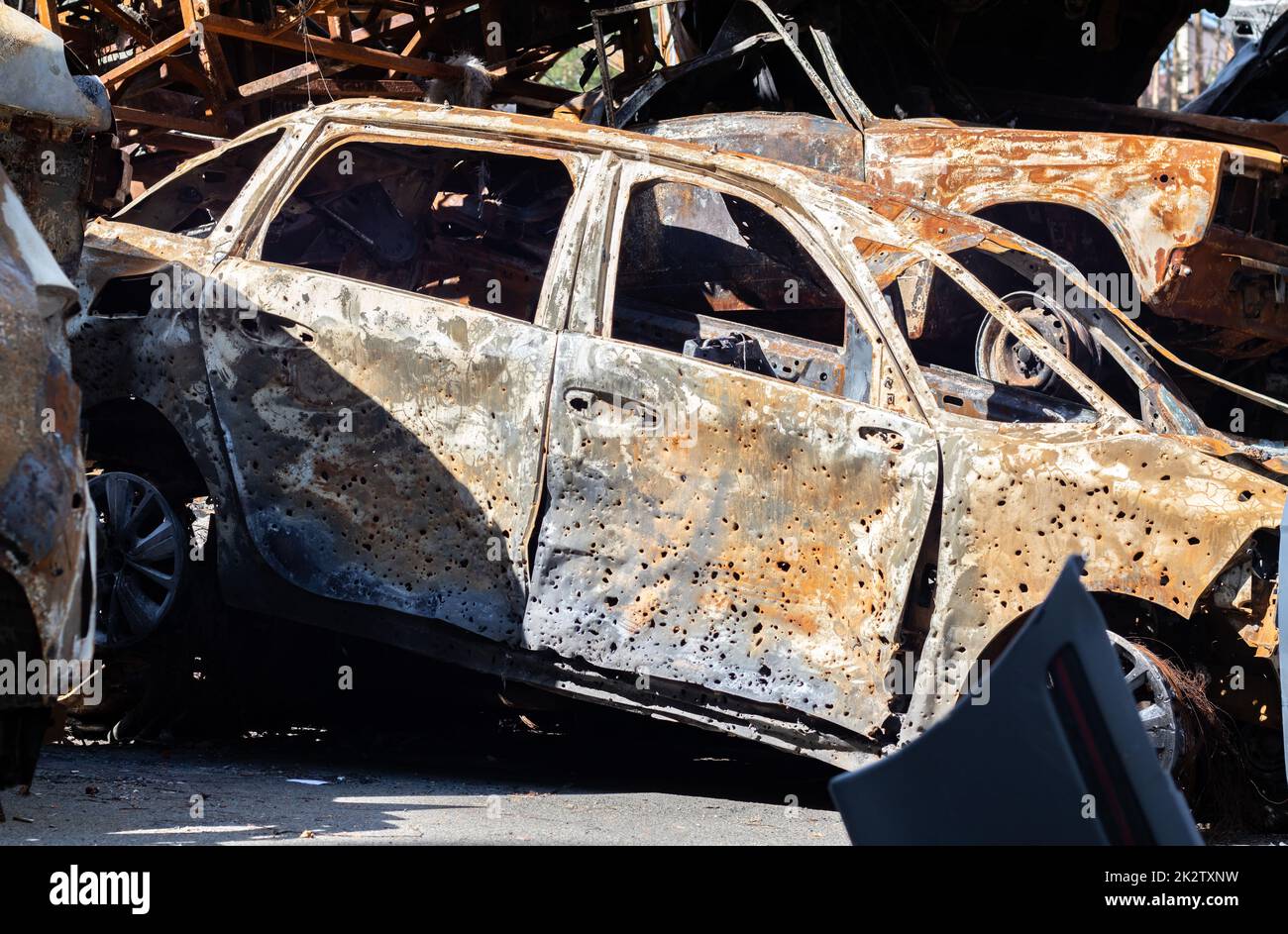 The car was completely destroyed by fire. Abandoned, burnt and rusty ...
