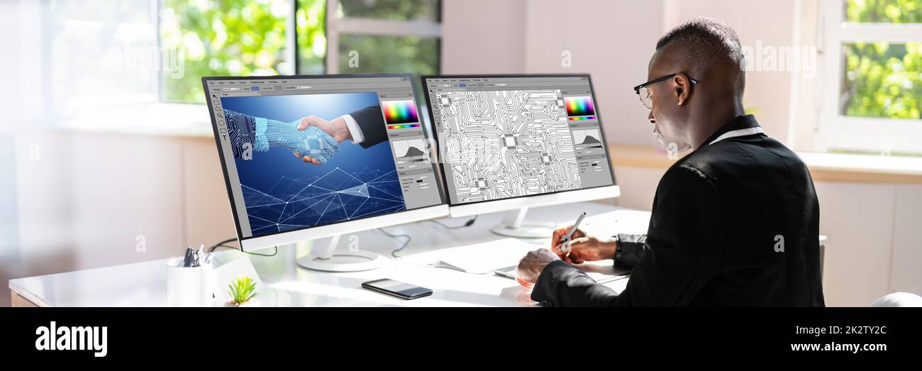 Designer Editing Photos On Computer Stock Photo - Alamy