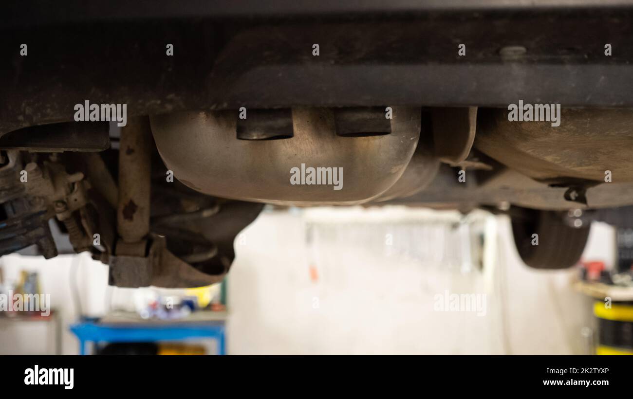 Car Exhaust system, car underneath Stock Photo - Alamy