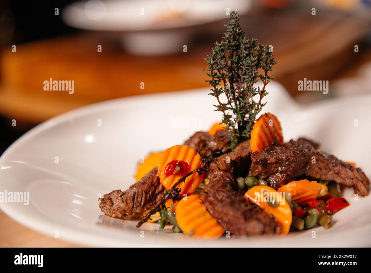 Beef Meal Presentation on White Plate Close Up. Chef Specialty Dish ...