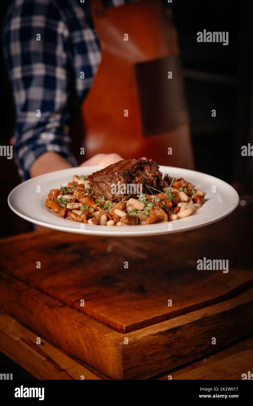 White Plate with delicious Beef Food dish. Food Preparation Stock Photo ...