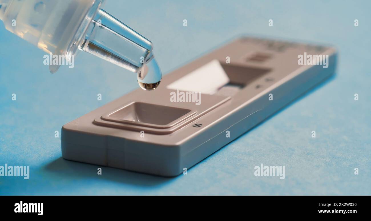 Test cassette with positive test result hi-res stock photography and ...