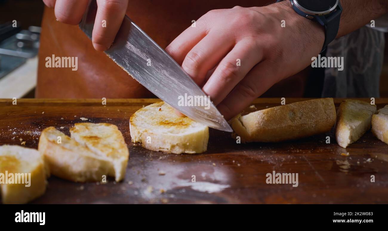 Cutting with a Knife Crusty Artisan Bread Stock Photo - Alamy