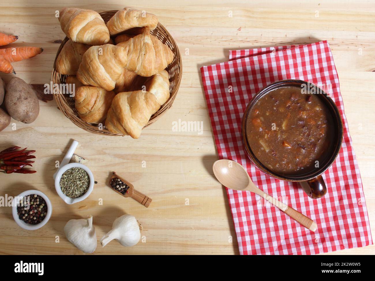 Beef Stew and Fresh Bread in Rustic Kitchen With Red and White ...