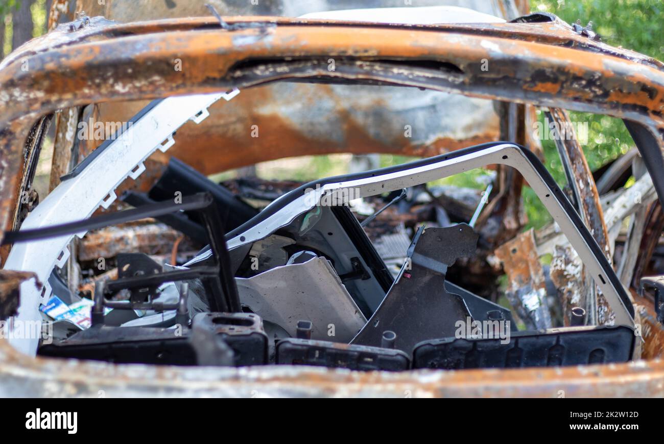 The car burned down completely, even the tires burned out. Burnt out ...