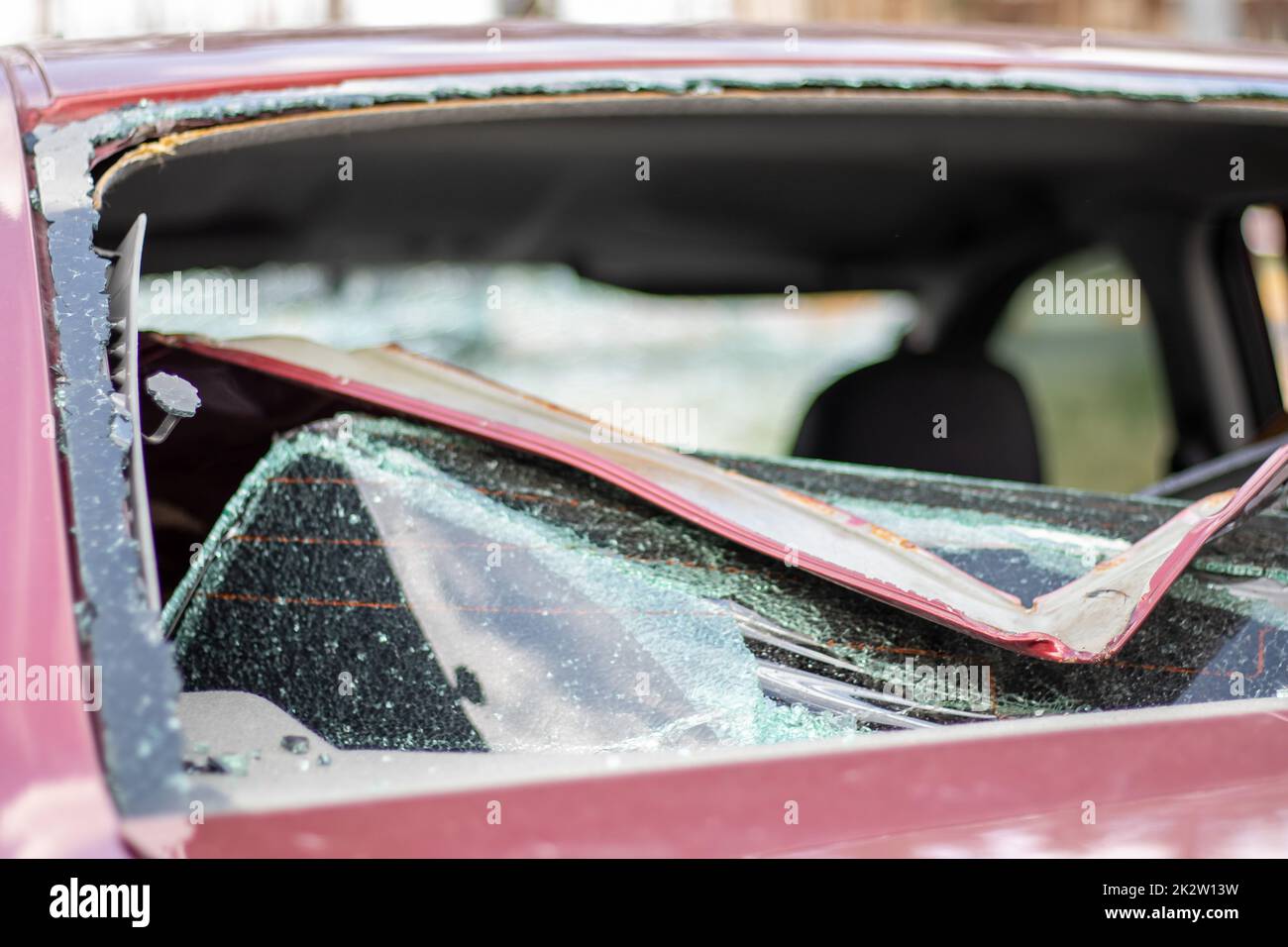 A car after an accident with a broken rear window. Broken window in a ...