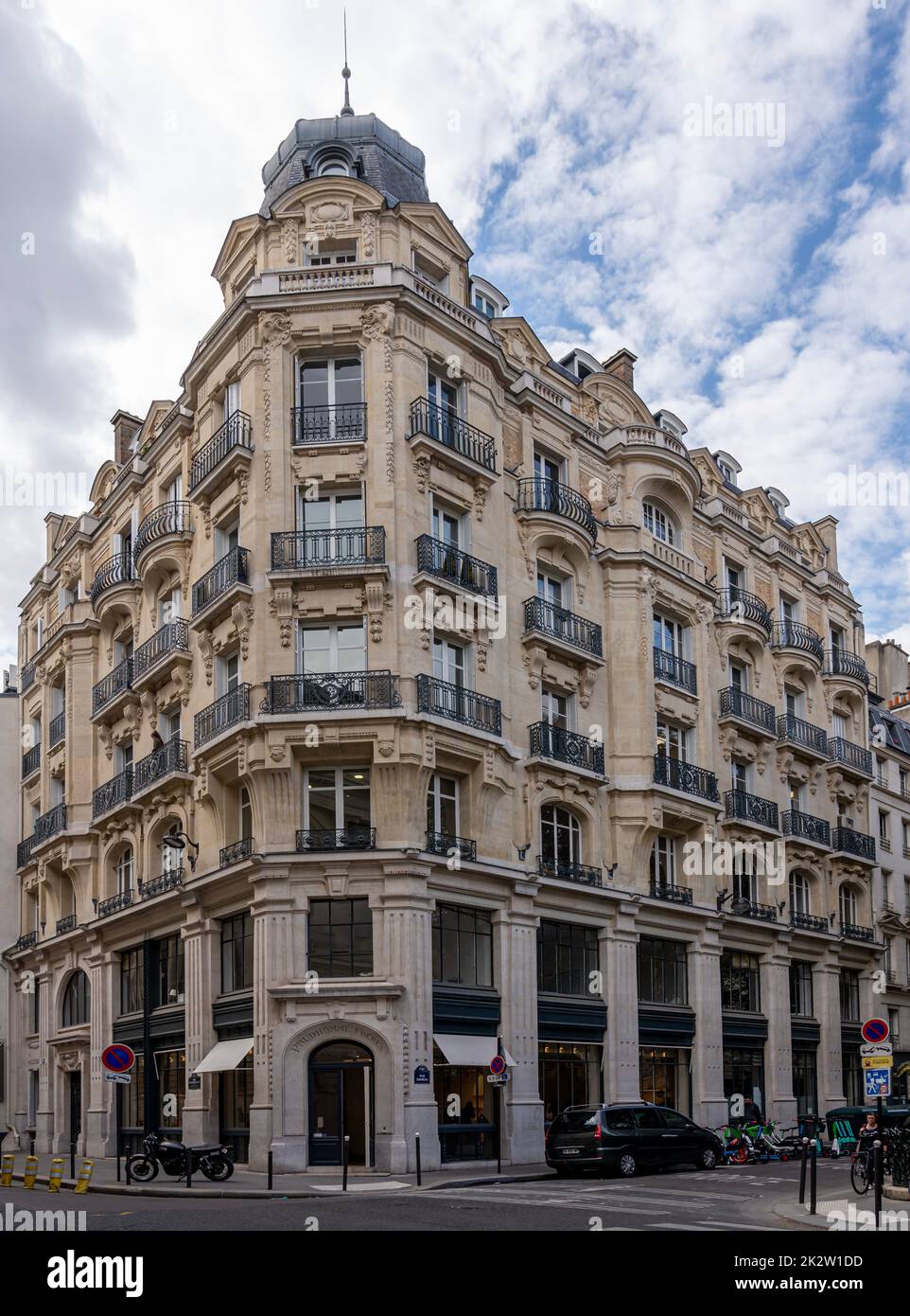 View of an old facade of a corner building Stock Photo - Alamy