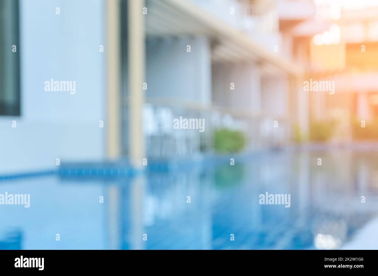 Blurry outdoor swimming pool background Stock Photo - Alamy
