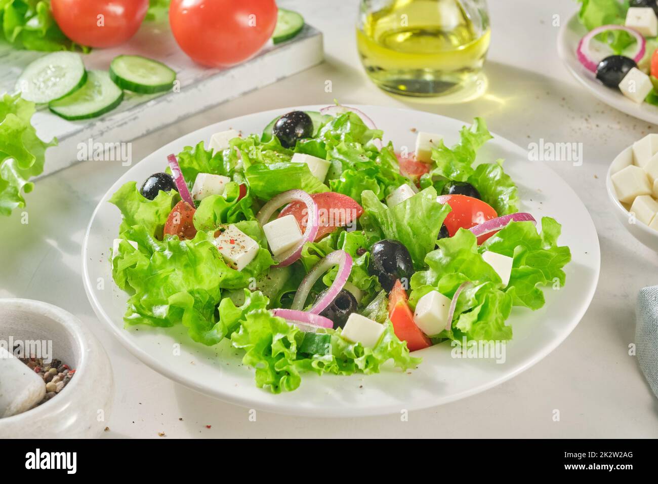 Traditional greek salad with fresh vegetables, feta cheese and olives ...