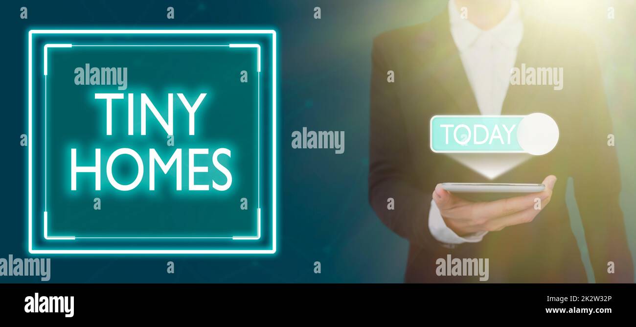 Text sign showing Tiny Homes. Conceptual photo houses contain one room ...