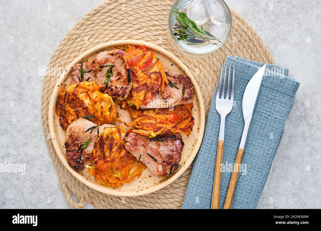 Roasted veal with rosemary and vegetable garnish. Top view Stock Photo ...